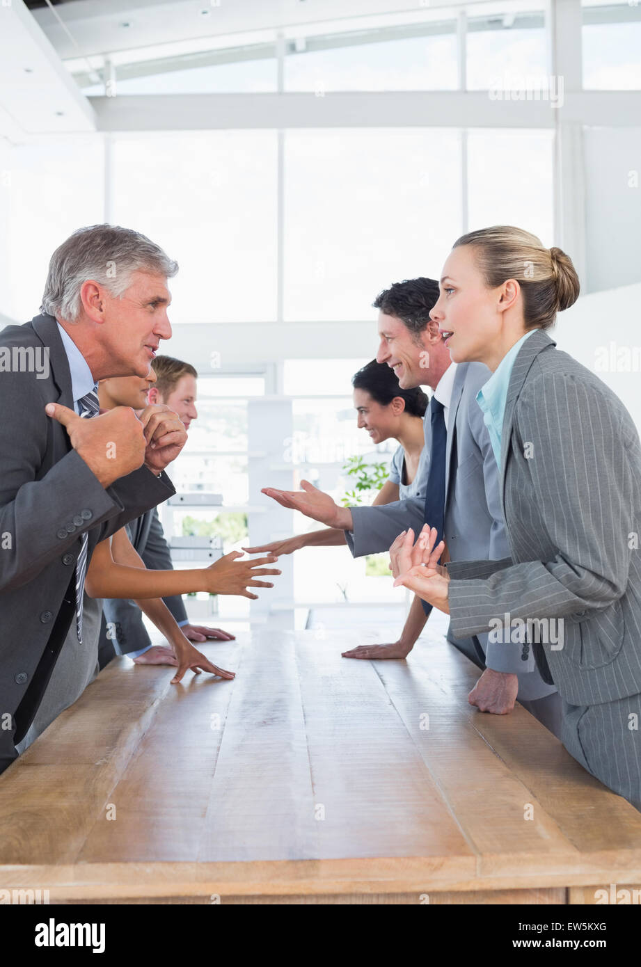 Business team discussing together Stock Photo - Alamy