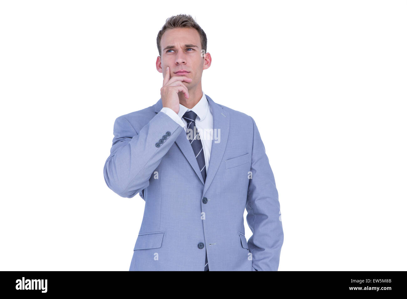 Handsome businessman thinking with finger on chin Stock Photo - Alamy