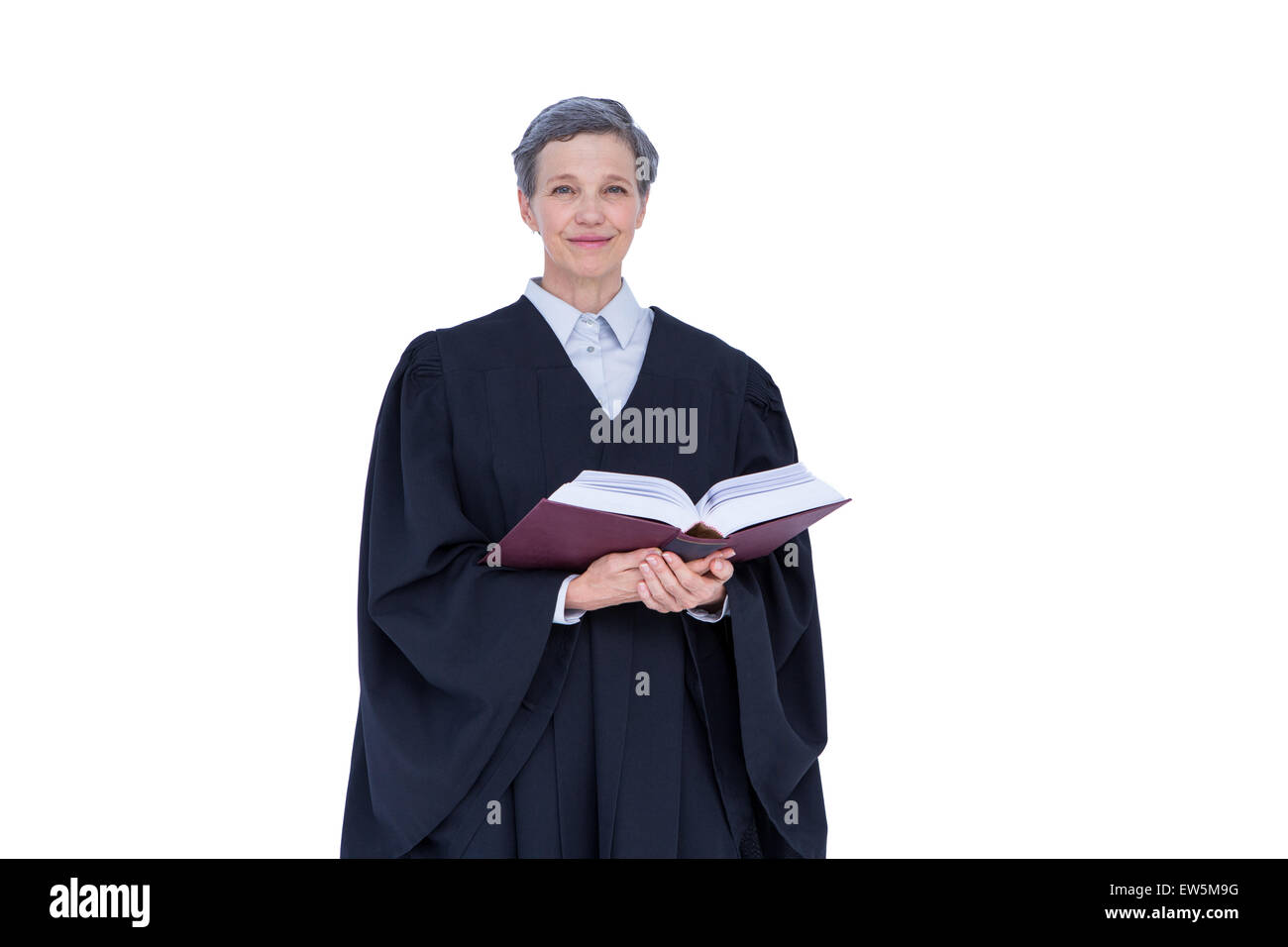 Lawyer looking at camera and holding law code Stock Photo - Alamy
