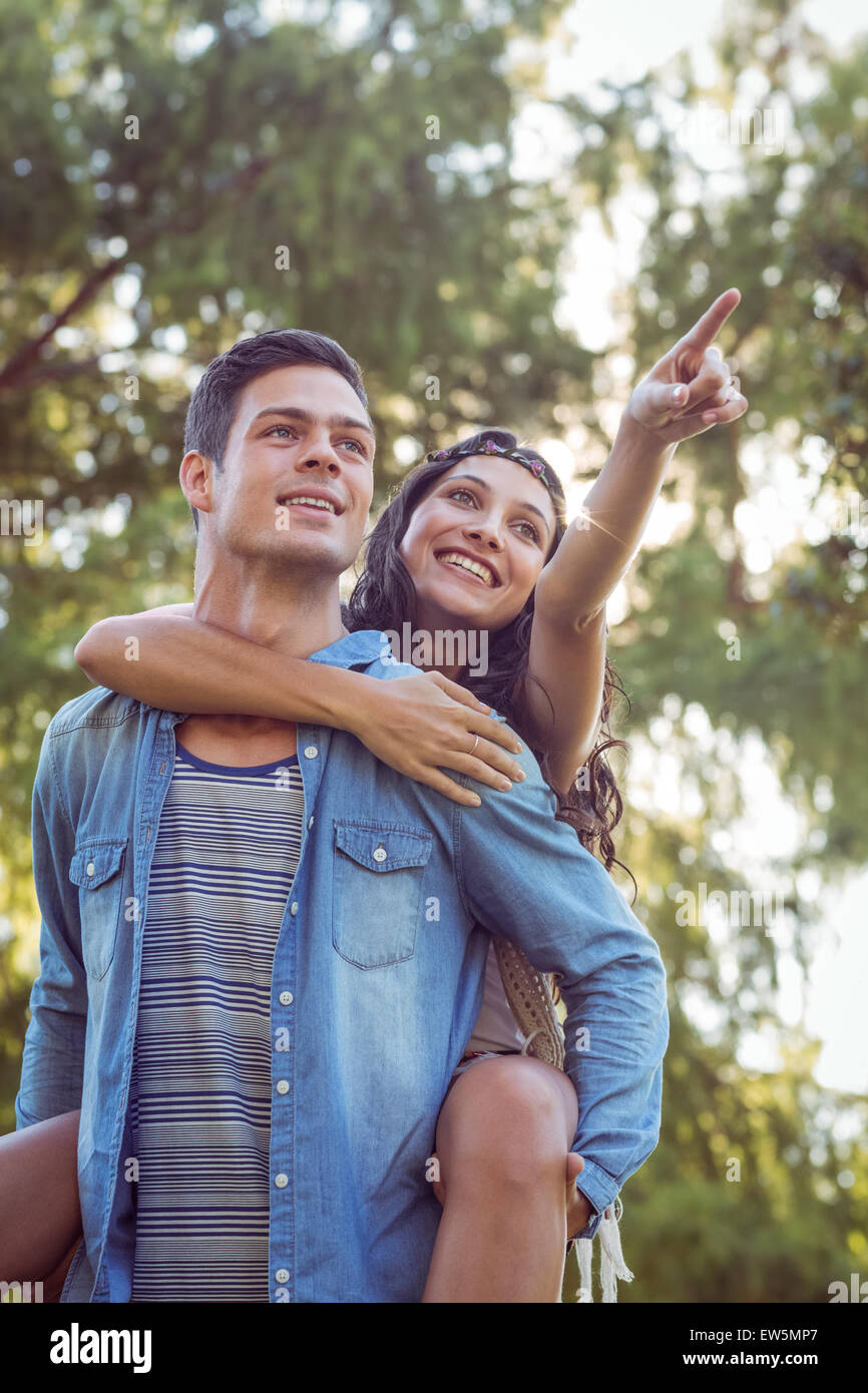 Cute couple smiling in the park Stock Photo - Alamy