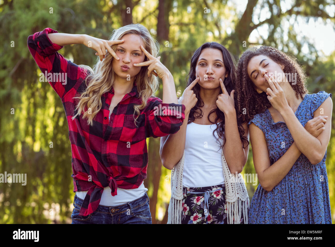 Happy hipsters in the park Stock Photo - Alamy