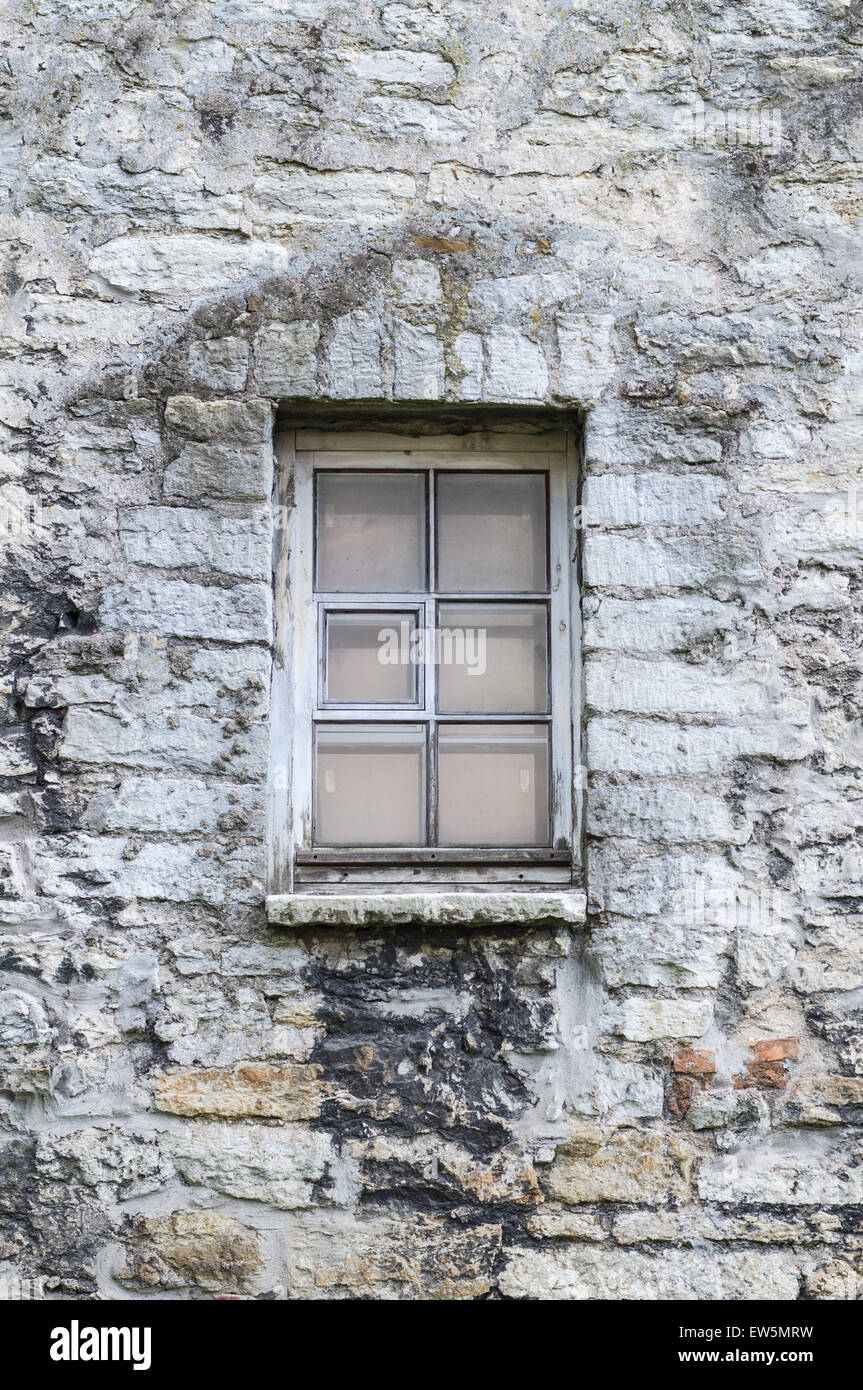 Window in medieval limestone wall Stock Photo - Alamy