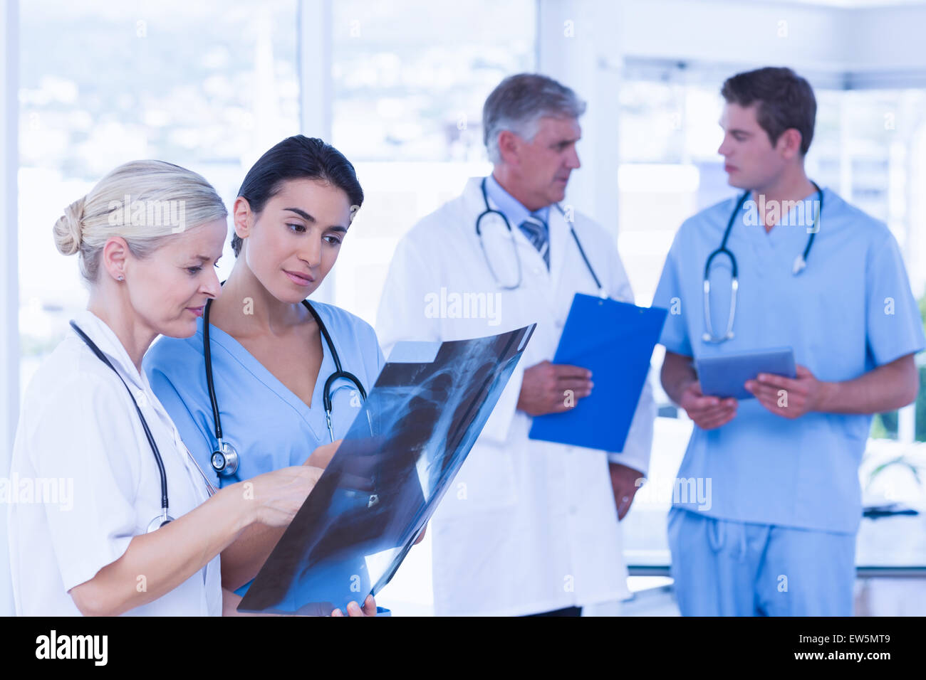 Smiling doctors discussing hi-res stock photography and images - Alamy