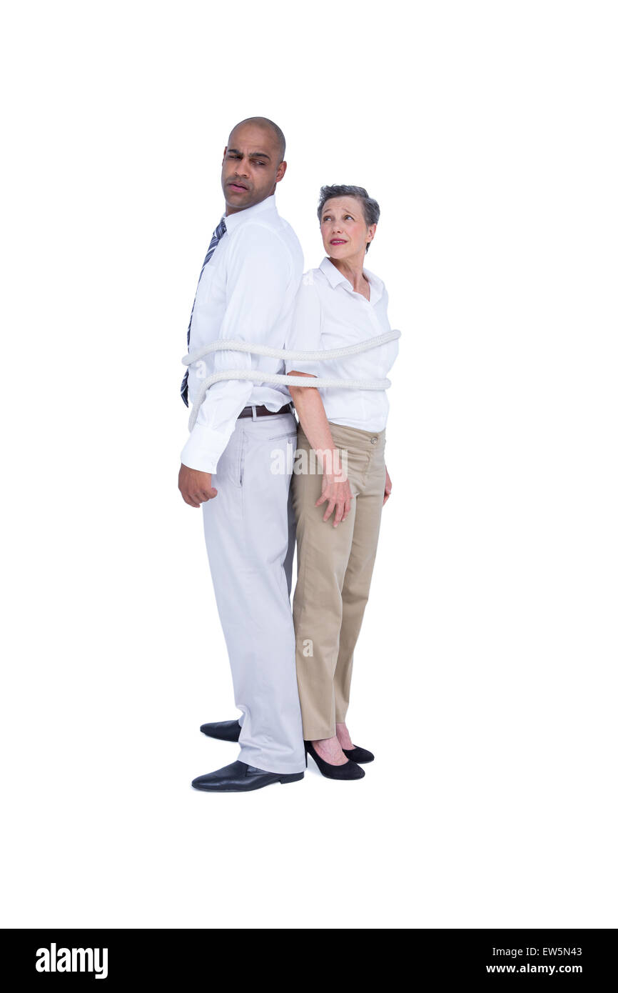 Business people standing back to back Stock Photo - Alamy