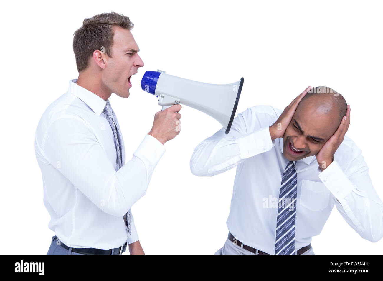 Businessman yelling with a megaphone at his colleague Stock Photo - Alamy