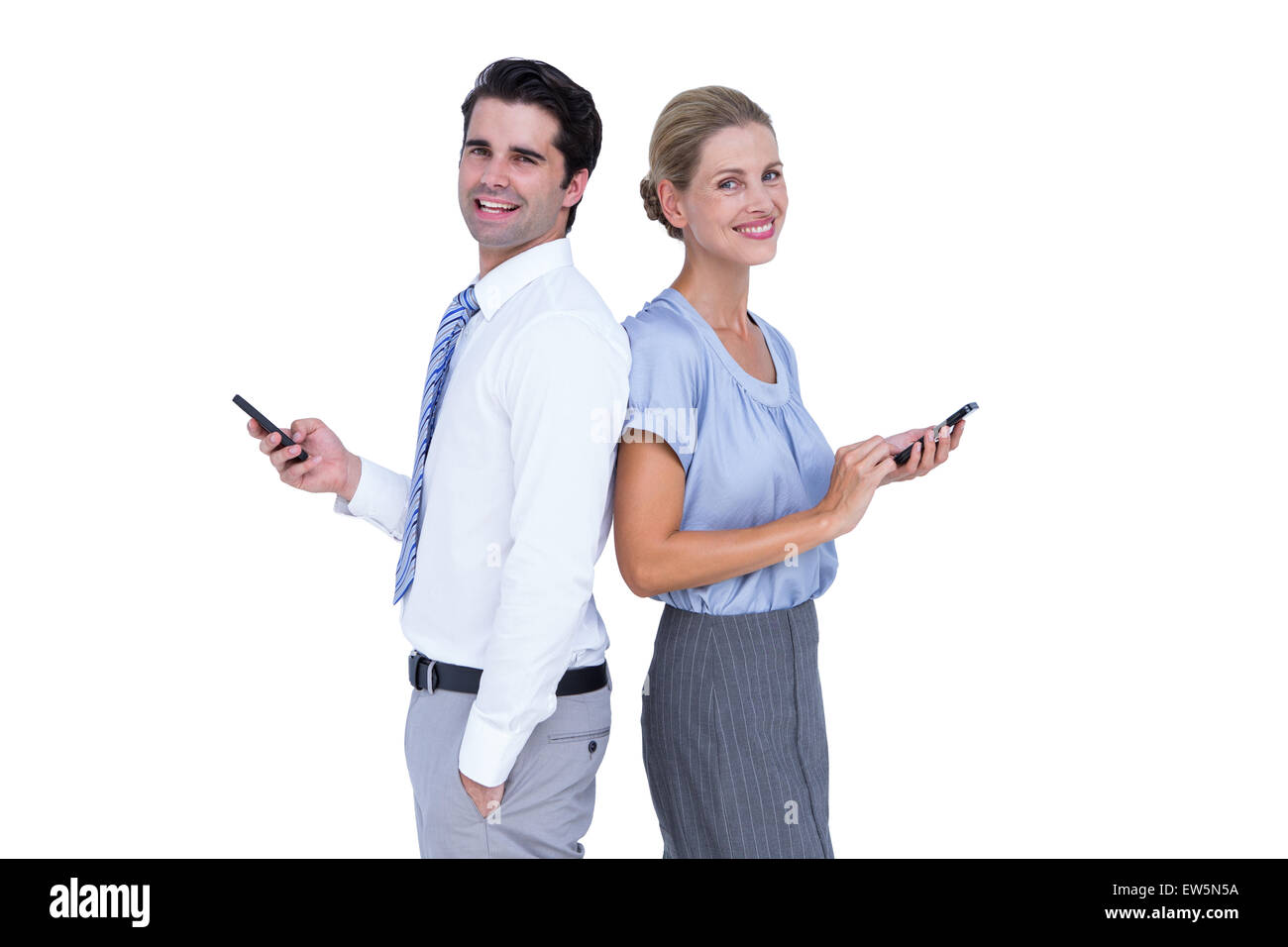 Business people using smartphone back to back Stock Photo - Alamy