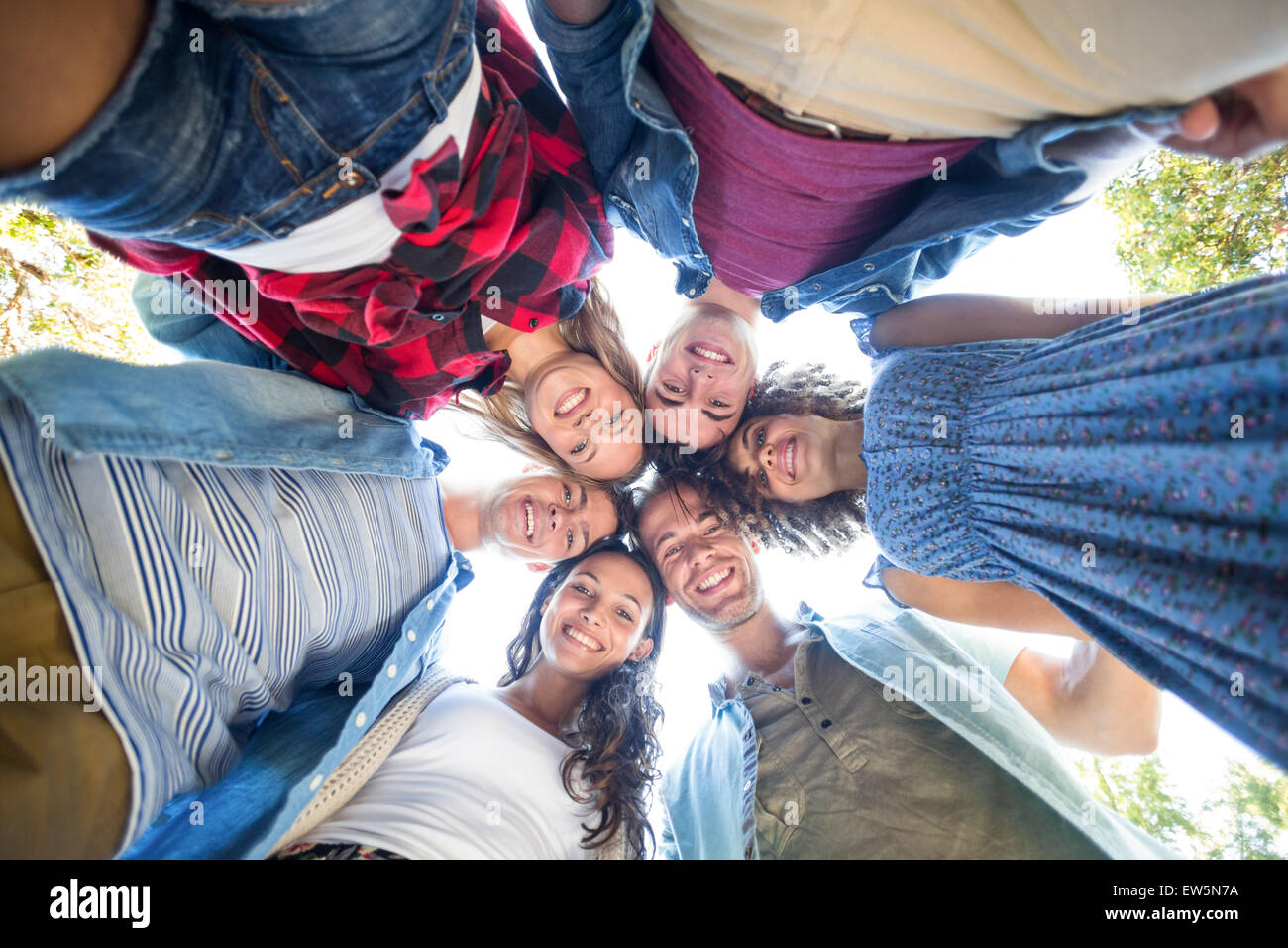 Happy friends in the park Stock Photo - Alamy