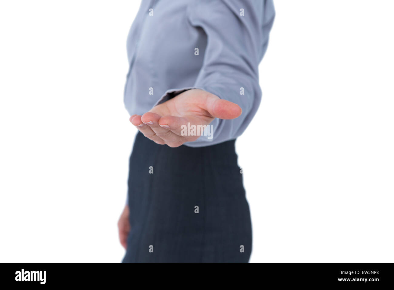Businesswoman presenting with hand Stock Photo - Alamy