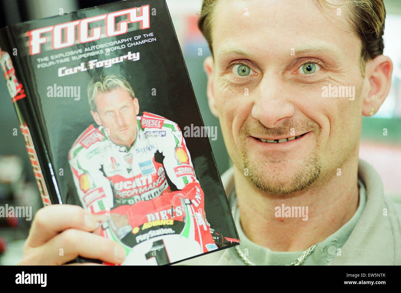 Carl Fogarty, four times World Superbike Champion, signing copies of ...