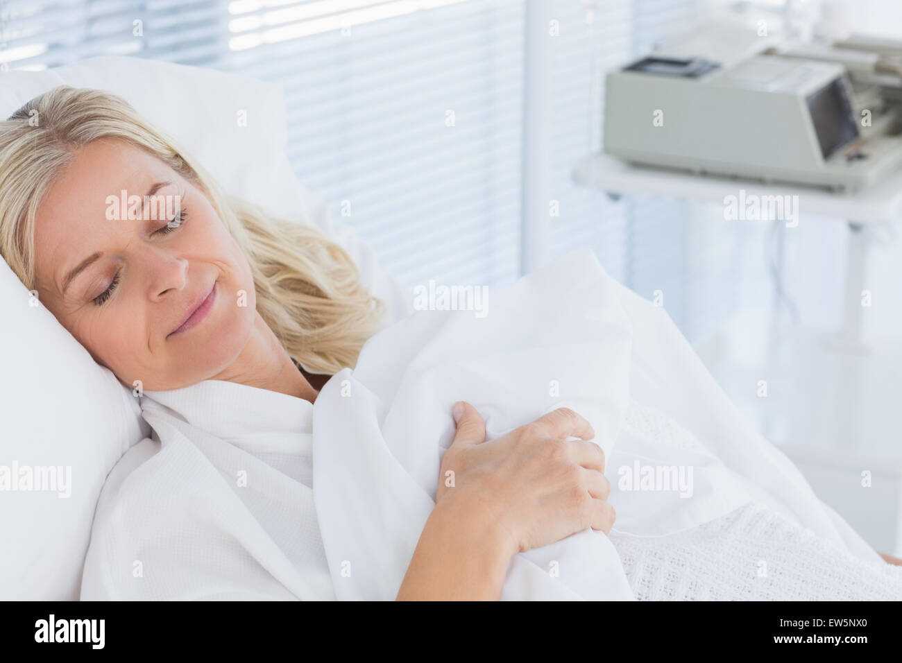 Patient resting on hospital bed hi-res stock photography and images - Alamy