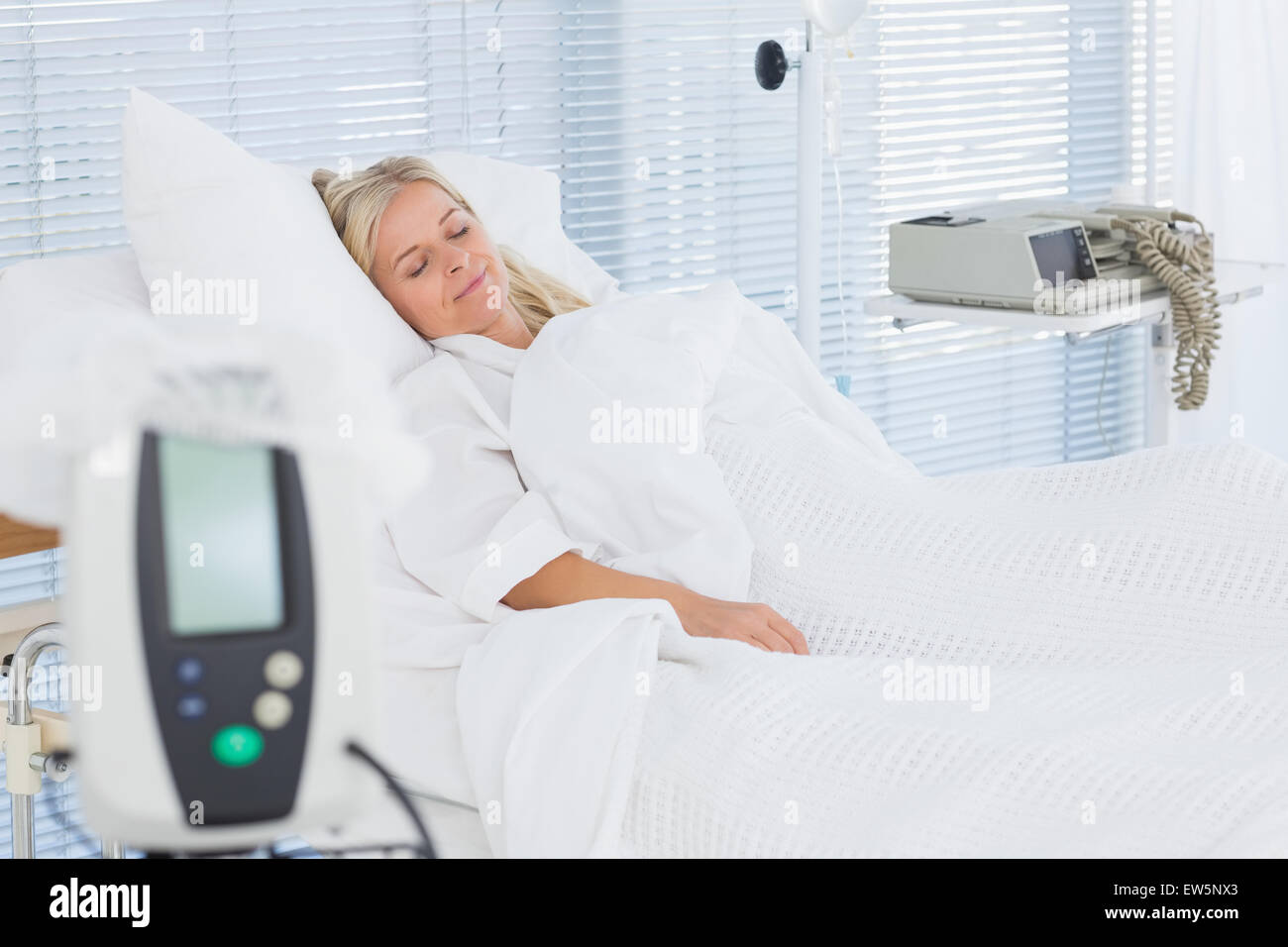 Happy patient lying bed hi-res stock photography and images - Alamy
