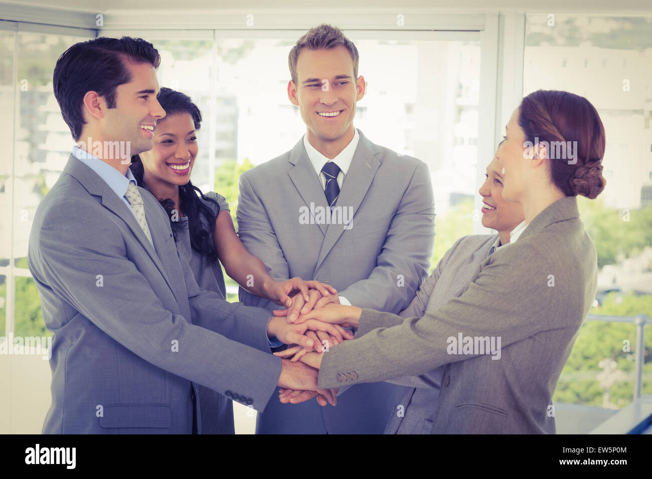 Business team celebrating a good job Stock Photo - Alamy