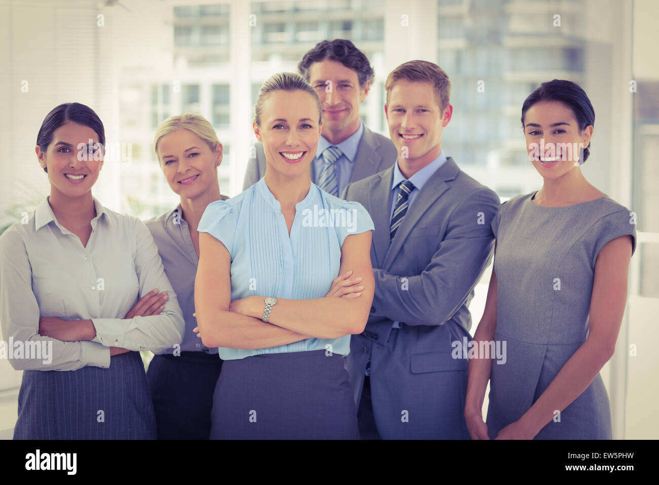 Business team smiling at camera Stock Photo - Alamy