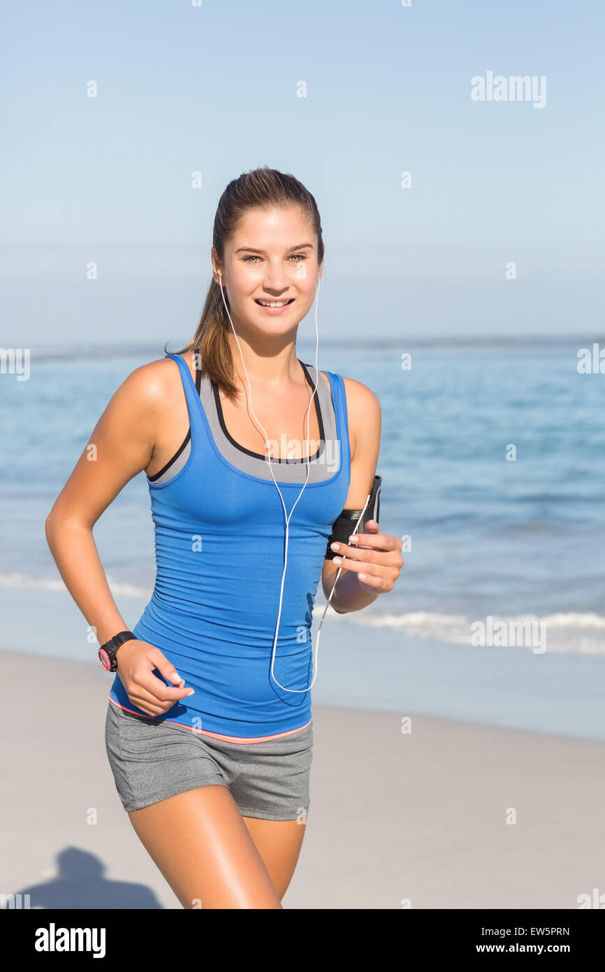 Fit woman doing jogging Stock Photo - Alamy
