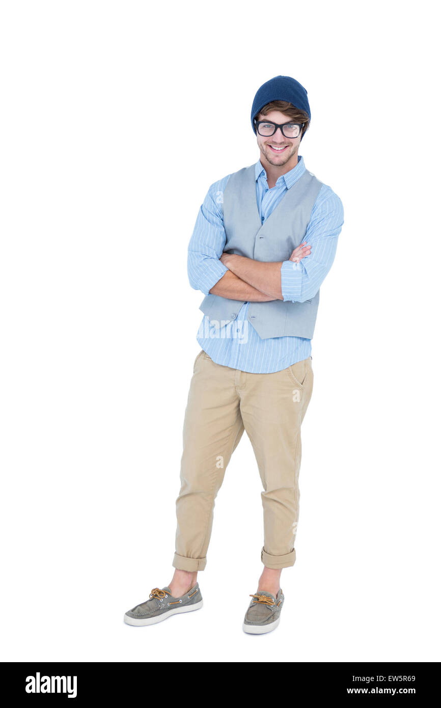 Geeky hipster with arms crossed looking at camera Stock Photo - Alamy