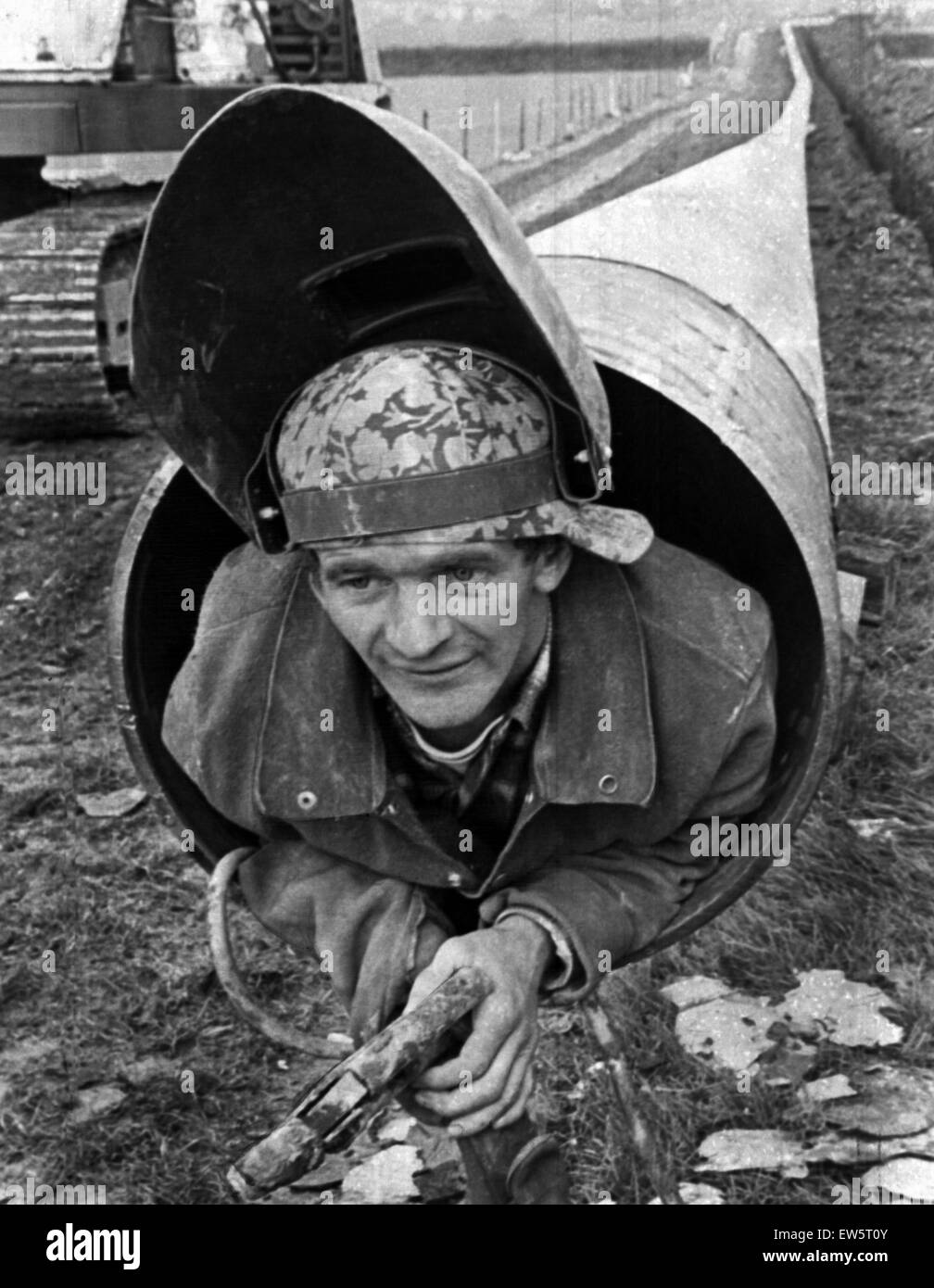 Lou Morris, The Human Pipe Cleaner, 6th November 1969. Lou pushes his ...