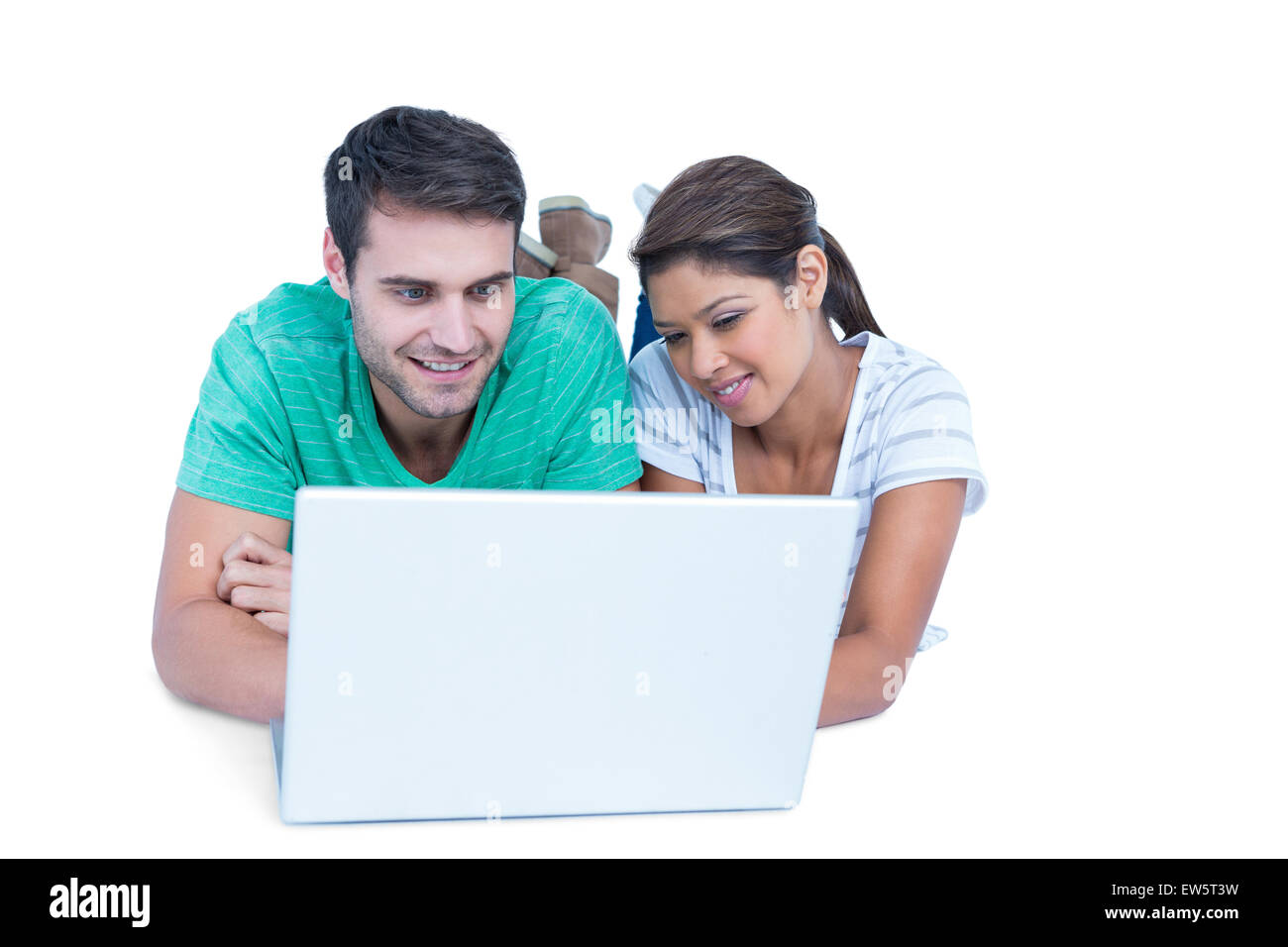 Couple looking at laptop computer Stock Photo - Alamy