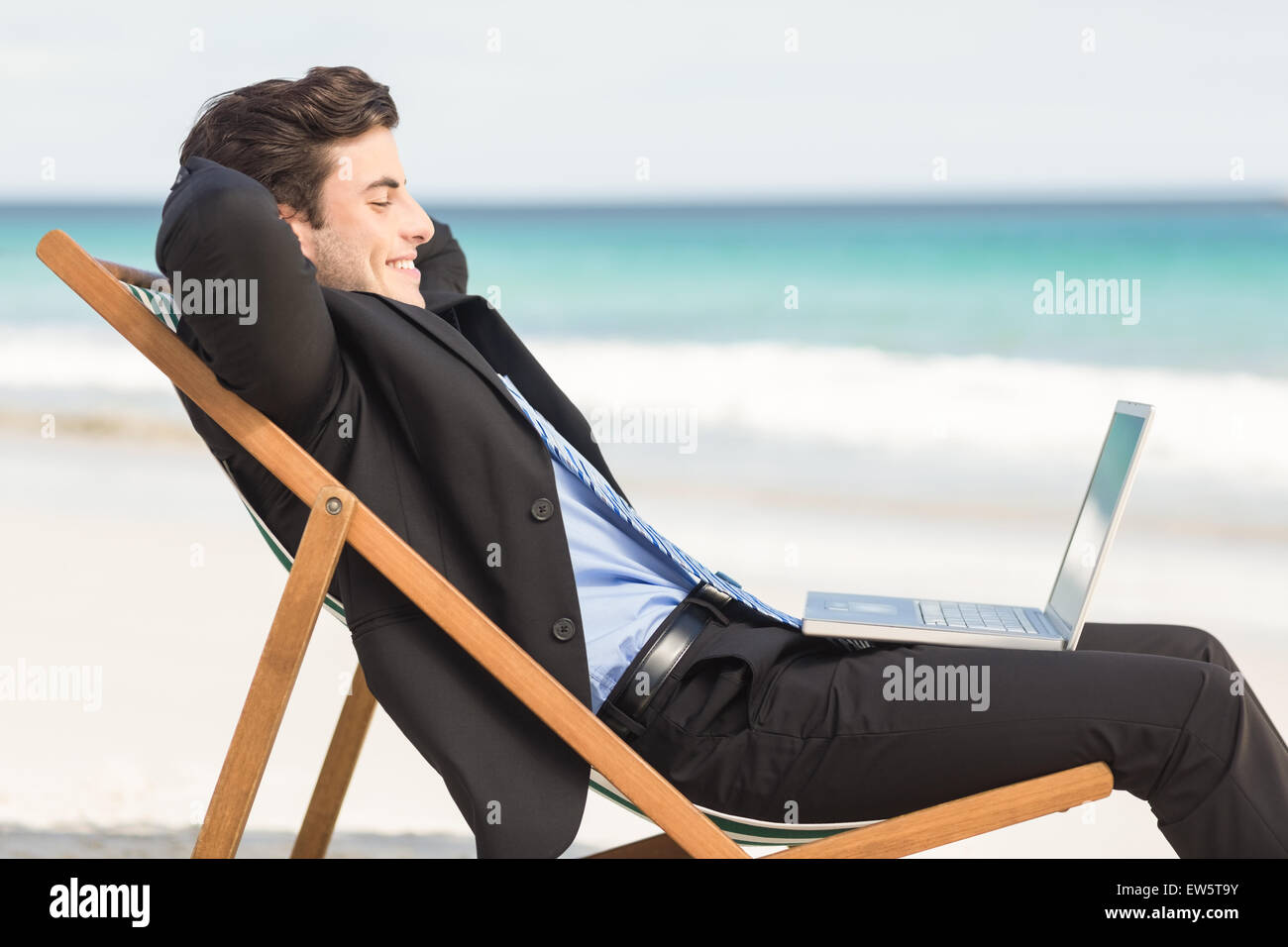 Businessman using his laptop Stock Photo - Alamy Businessman using his laptop Stock Photo - Alamy