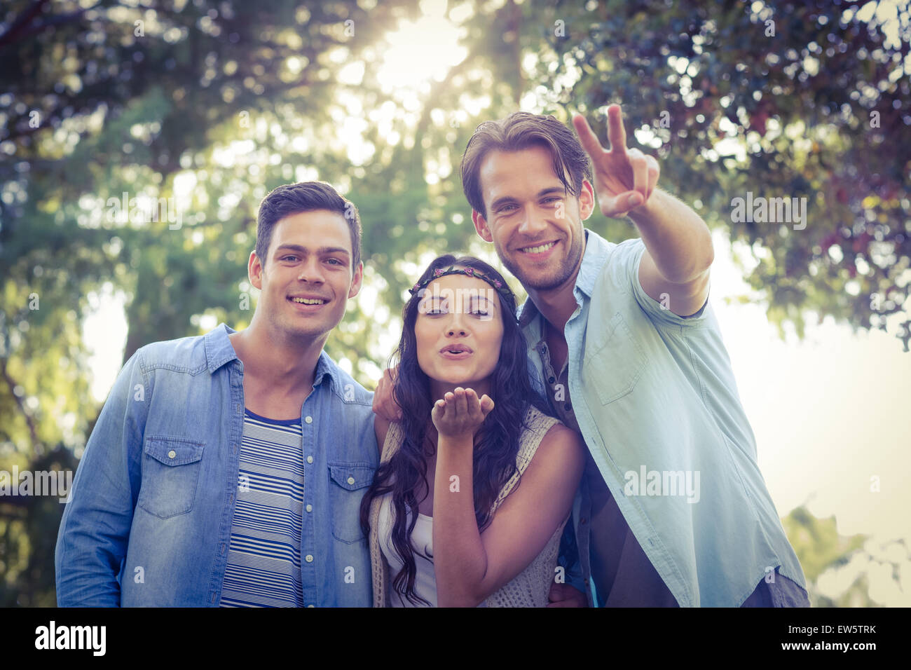 Happy friends in the park Stock Photo - Alamy