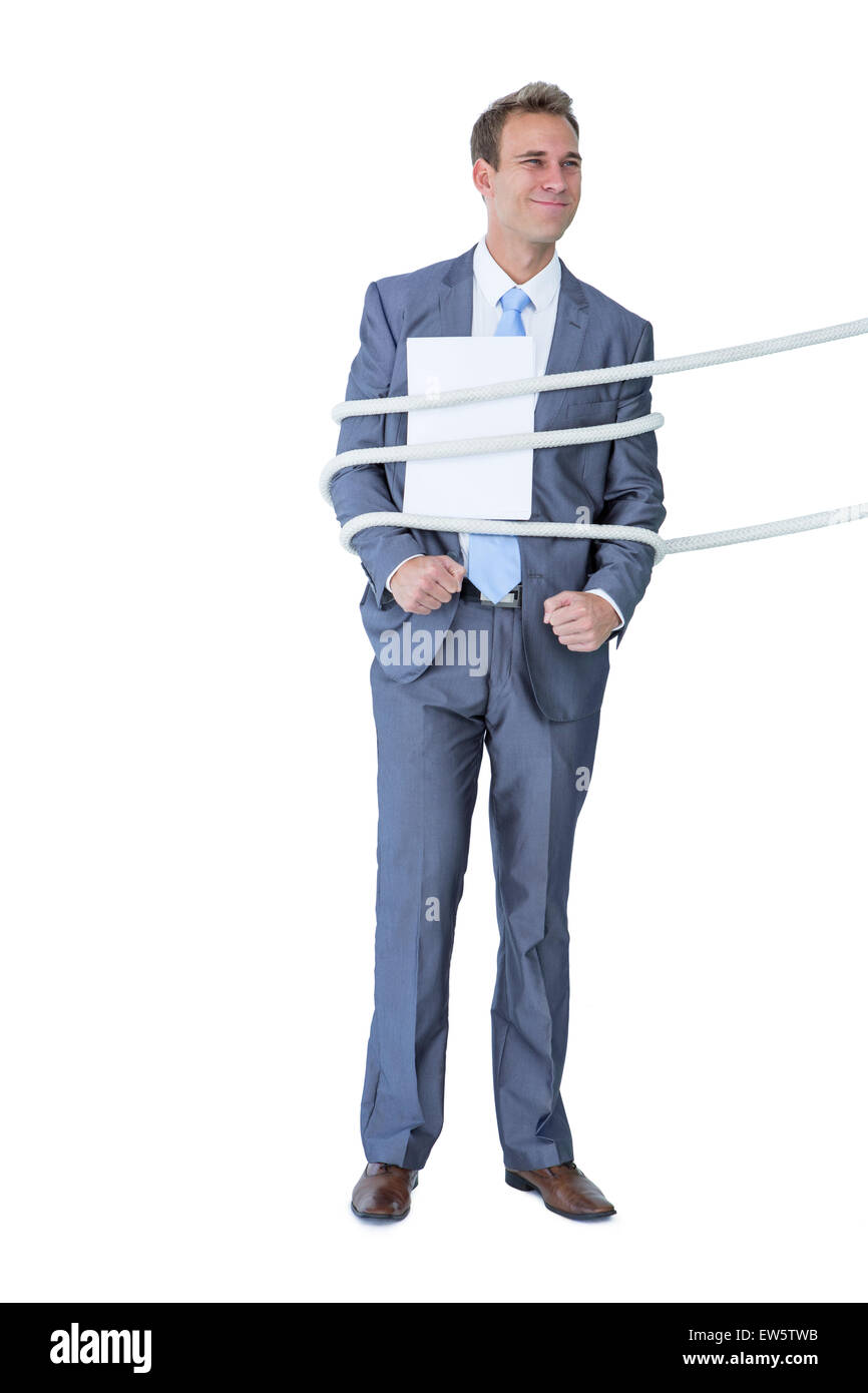A businessman tie up by rope Stock Photo - Alamy