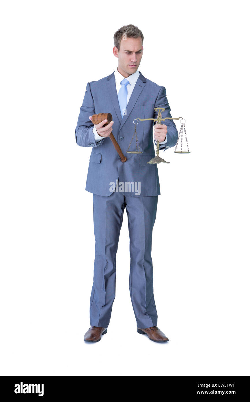 Businessman holding hammer balance hi-res stock photography and images ...