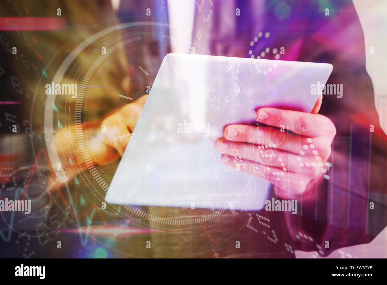 Composite image of businessman scrolling on his digital tablet Stock ...