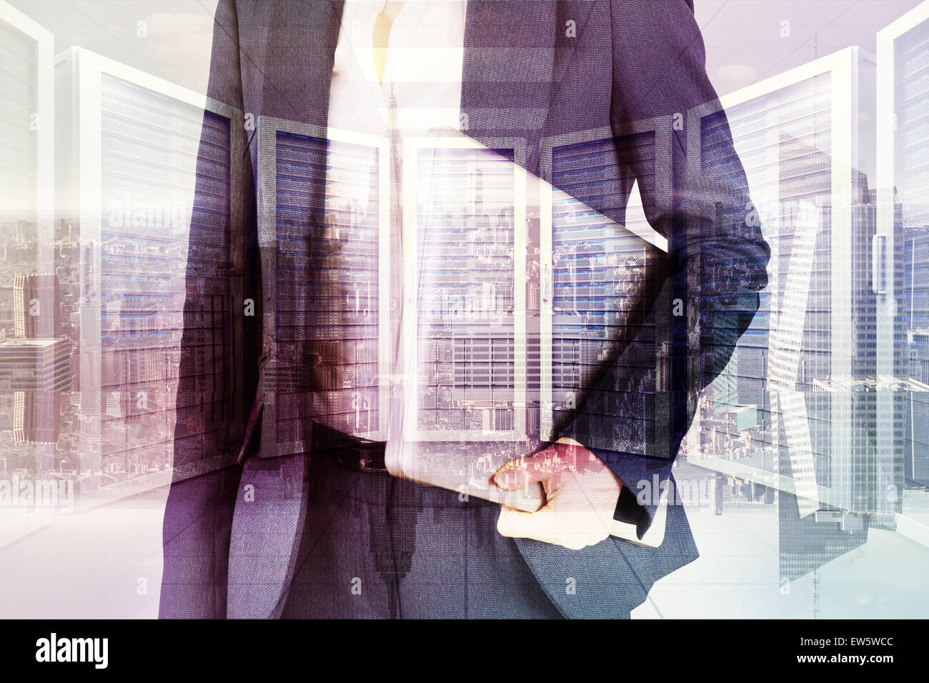 Composite image of businesswoman holding laptop Stock Photo - Alamy