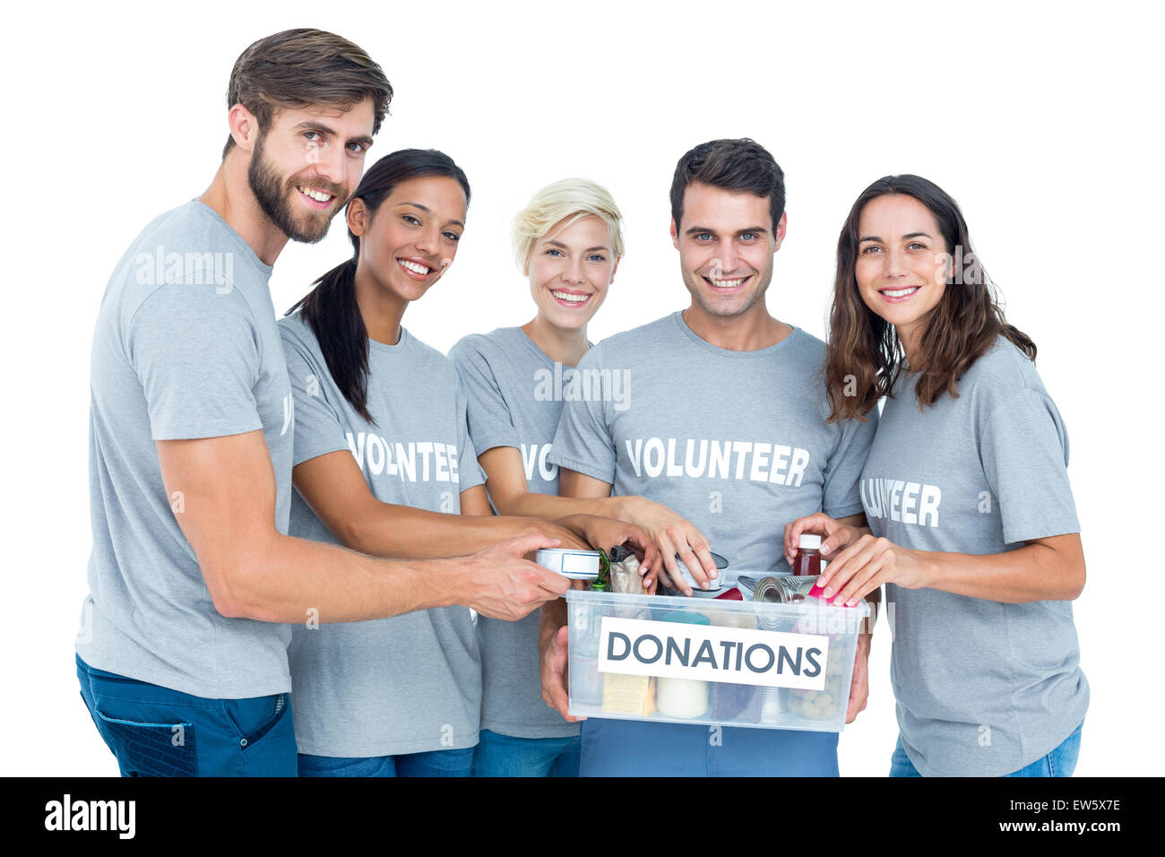 Volunteers friends separating donation stuffs Stock Photo - Alamy