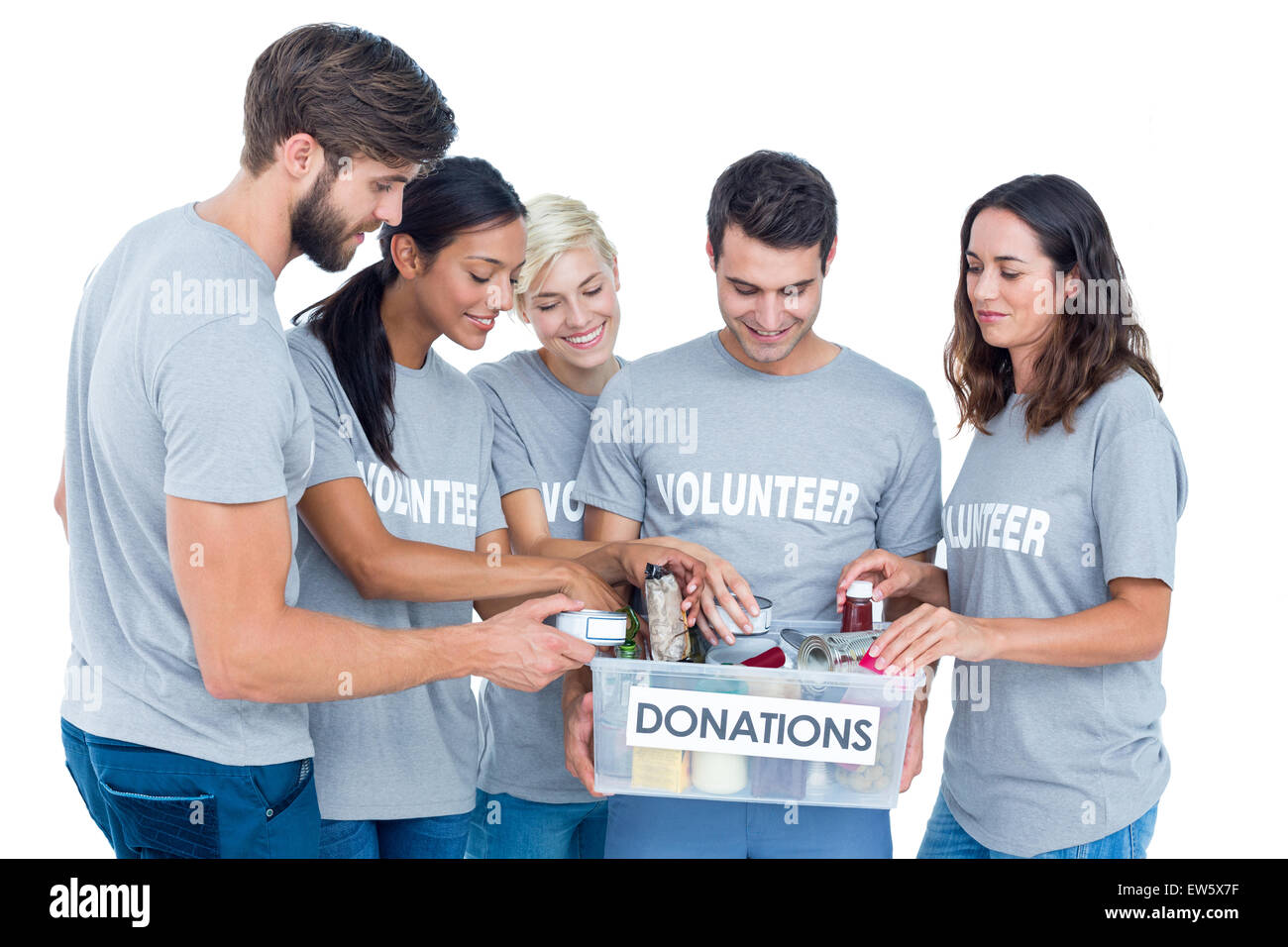 Volunteers friends separating donation stuffs Stock Photo - Alamy