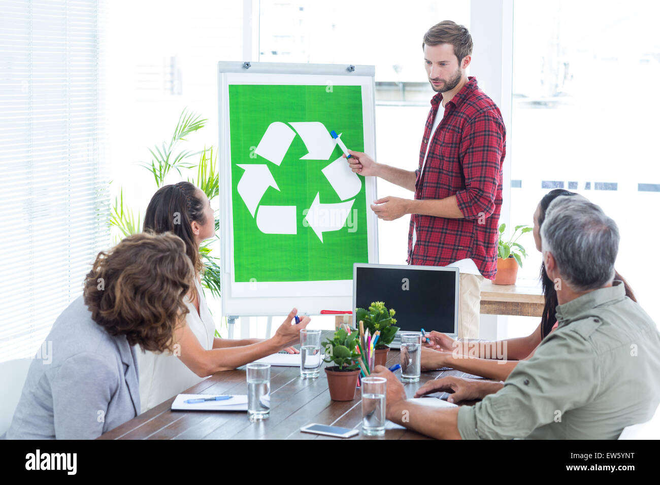 Young creative team having a meeting about recycling Stock Photo - Alamy