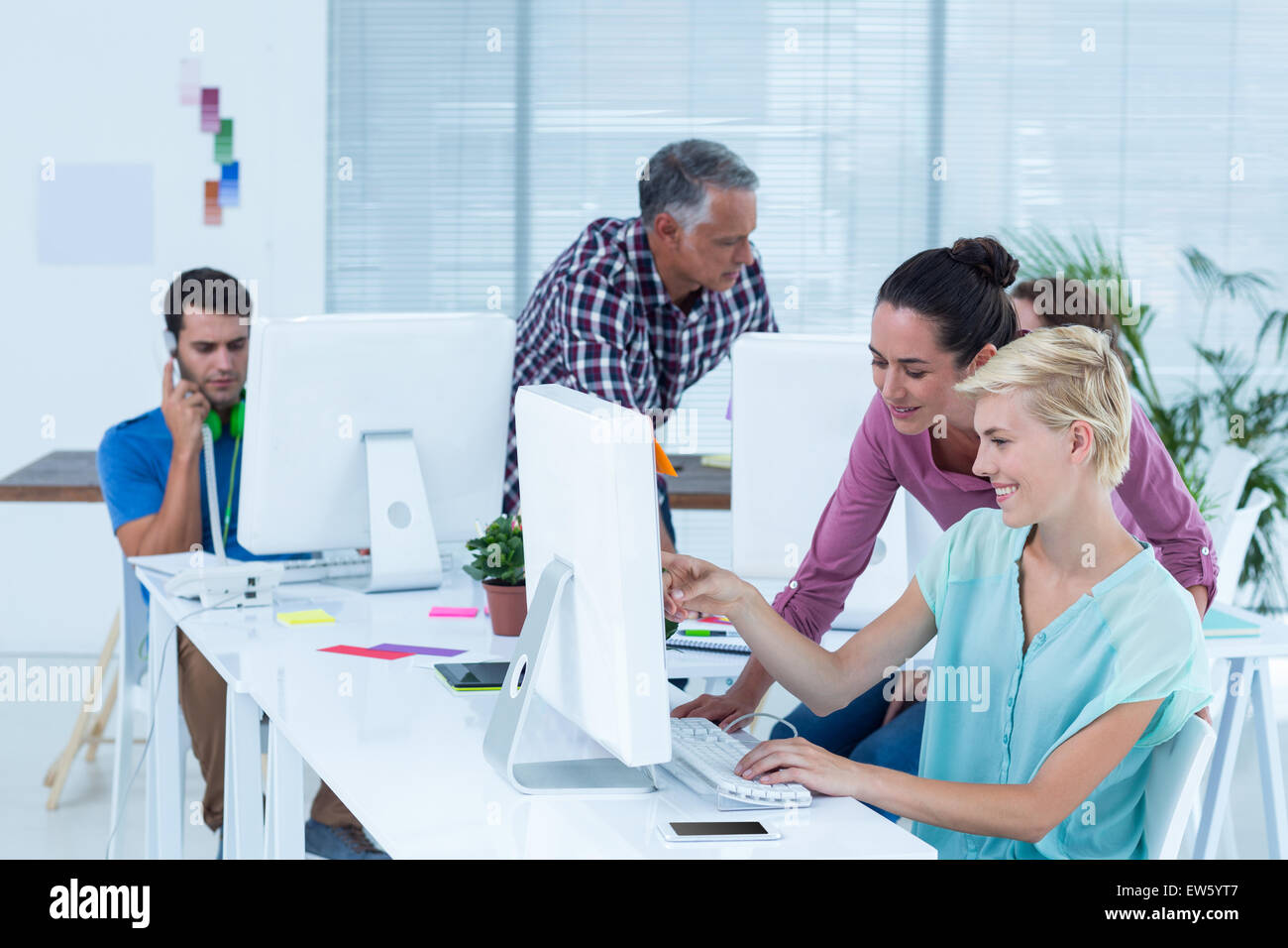 businesswomen using computer Stock Photo - Alamy