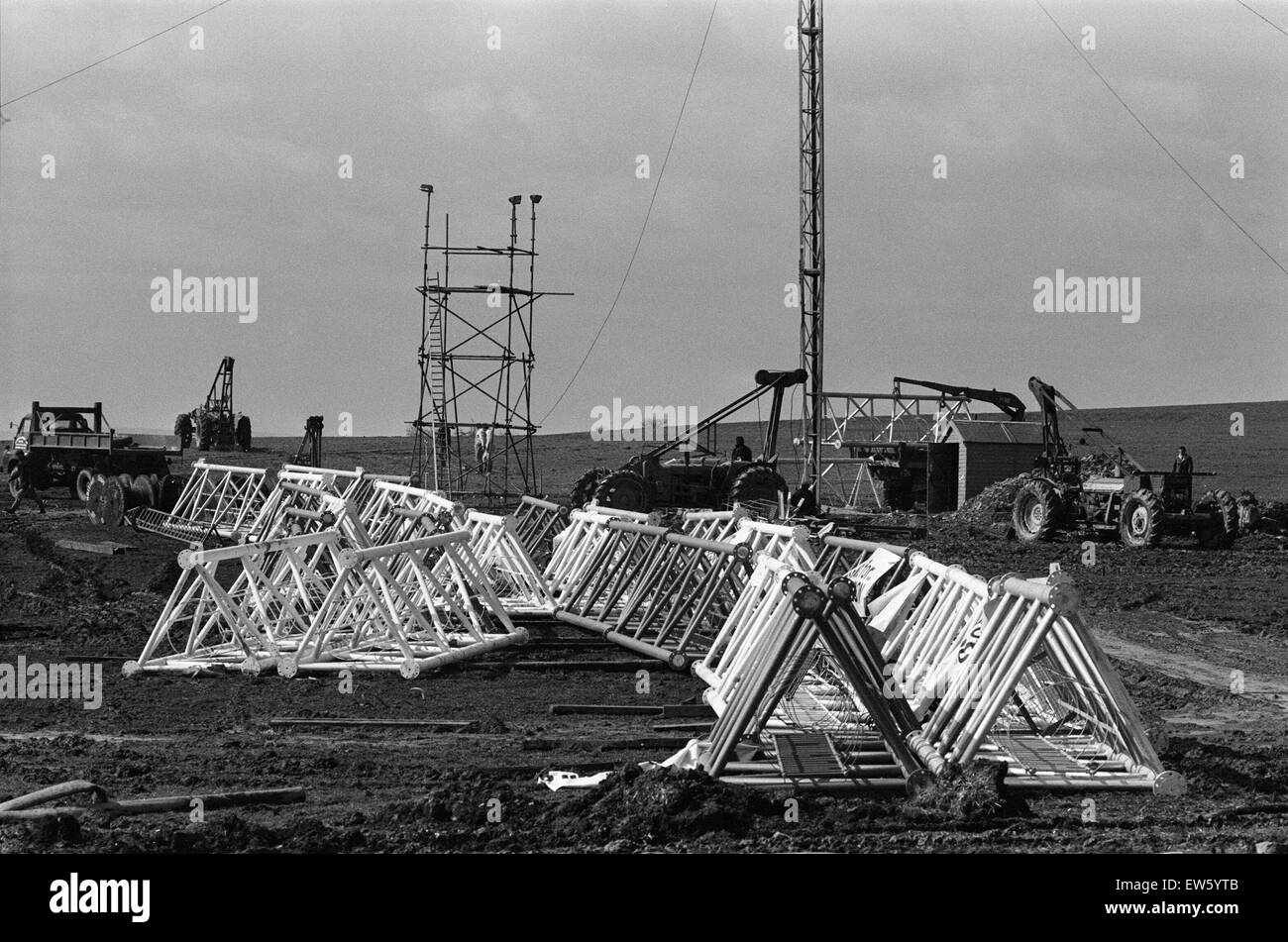 The collapsed Emley Moor transmitting station mast lies on the ground ...