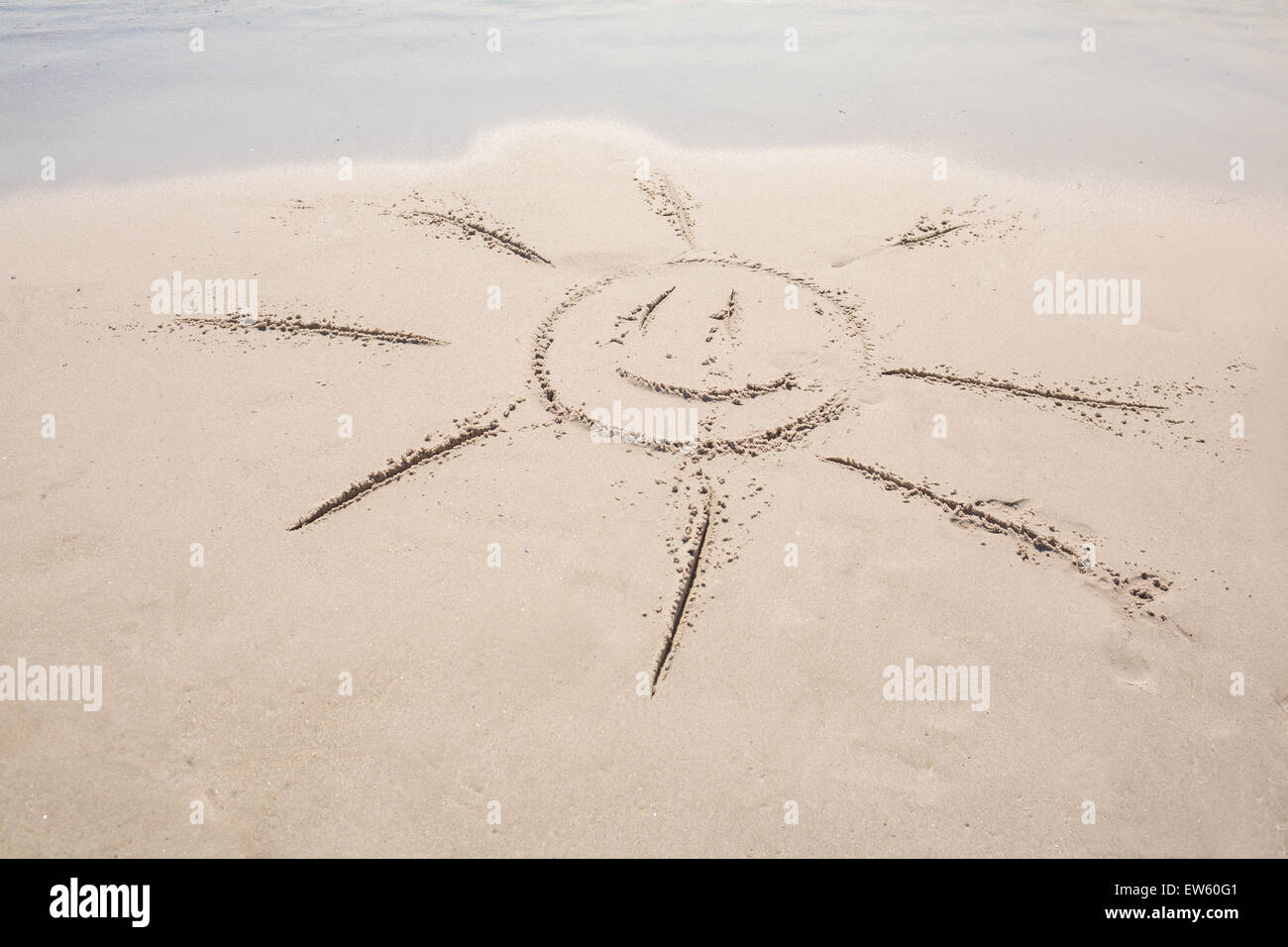 Sun drawing in sand hi-res stock photography and images - Alamy