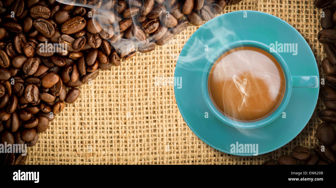Composite image of blue cup of coffee Stock Photo - Alamy