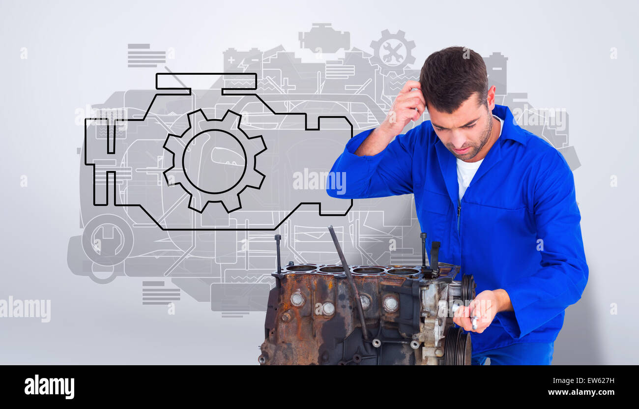 Confused male technician scratching head hi-res stock photography and ...