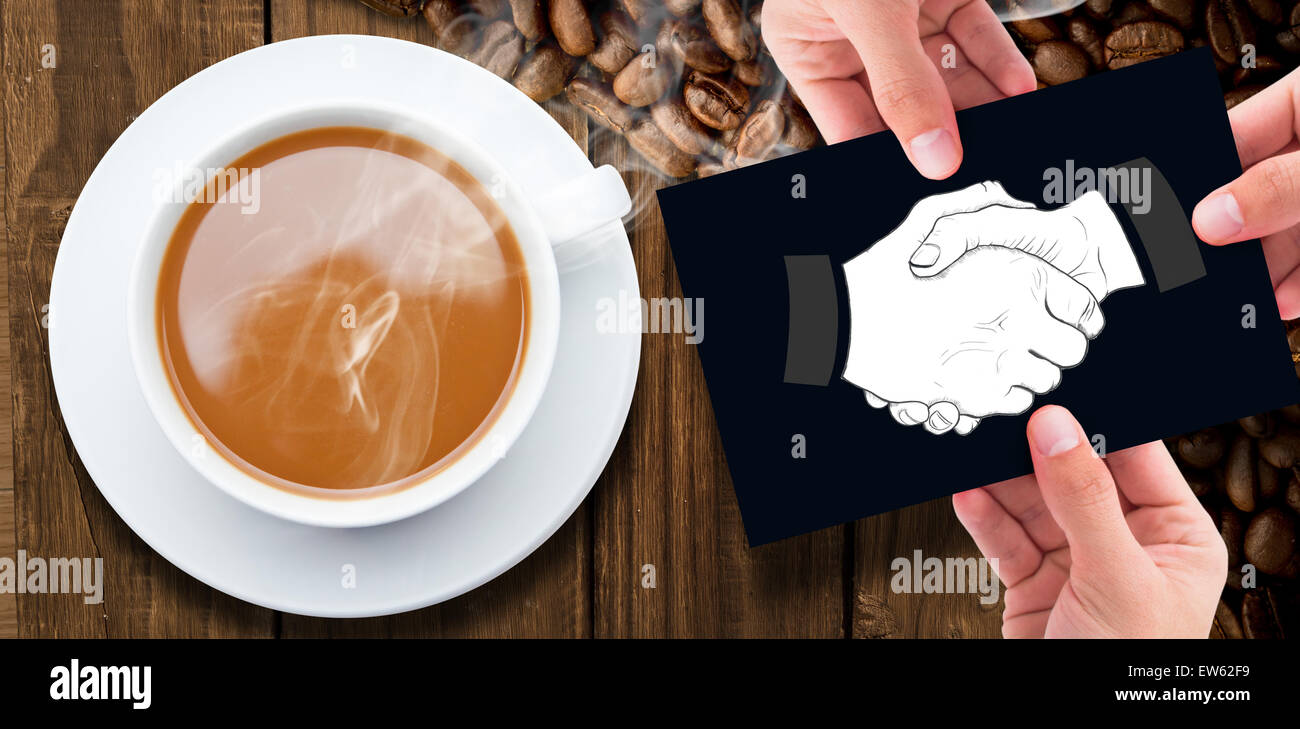 Composite image of hand showing card Stock Photo - Alamy