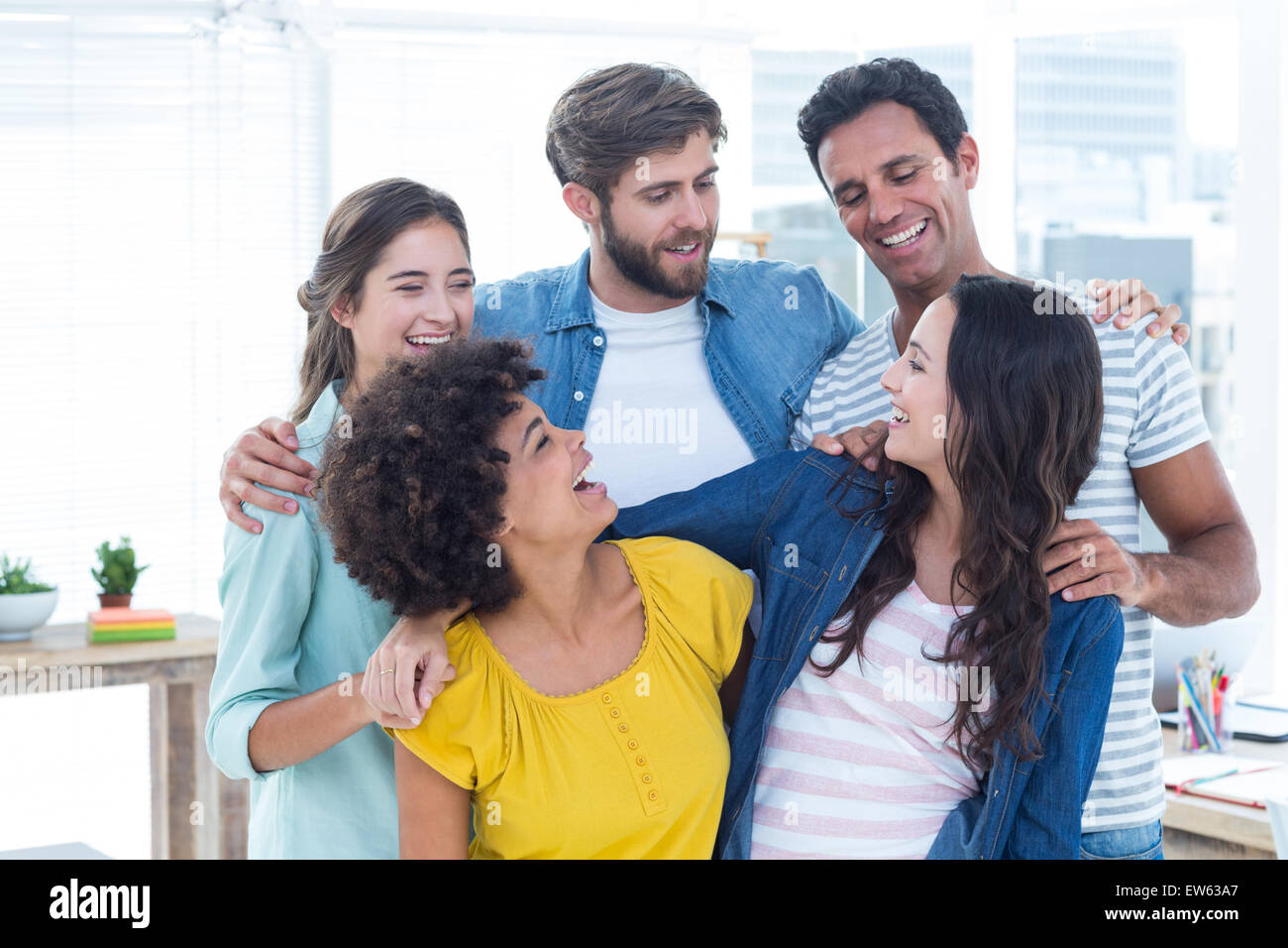 Group portrait of happy young colleagues Stock Photo - Alamy
