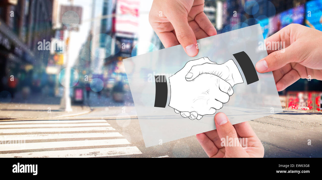 Composite image of hand showing card Stock Photo - Alamy