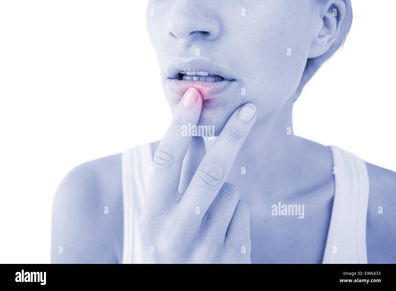 Thoughtful woman touching her lips Stock Photo - Alamy