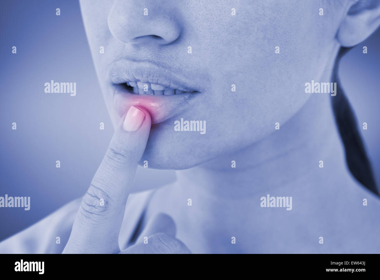 Composite image of woman pointing her lip Stock Photo - Alamy