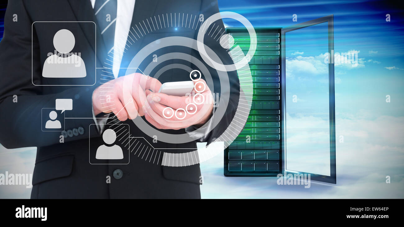 Composite image of businessman sending a text message Stock Photo - Alamy