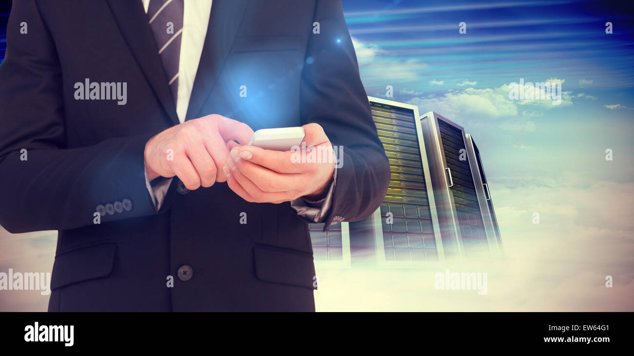 Composite image of businessman sending a text message Stock Photo - Alamy