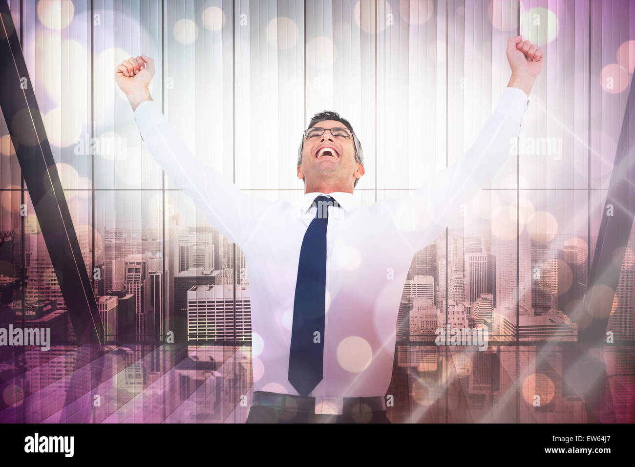 Composite image of excited businessman with glasses cheering Stock ...