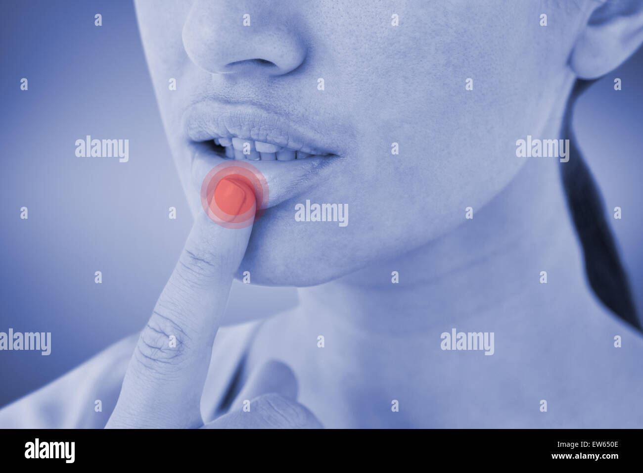 Composite image of woman pointing her lip Stock Photo - Alamy
