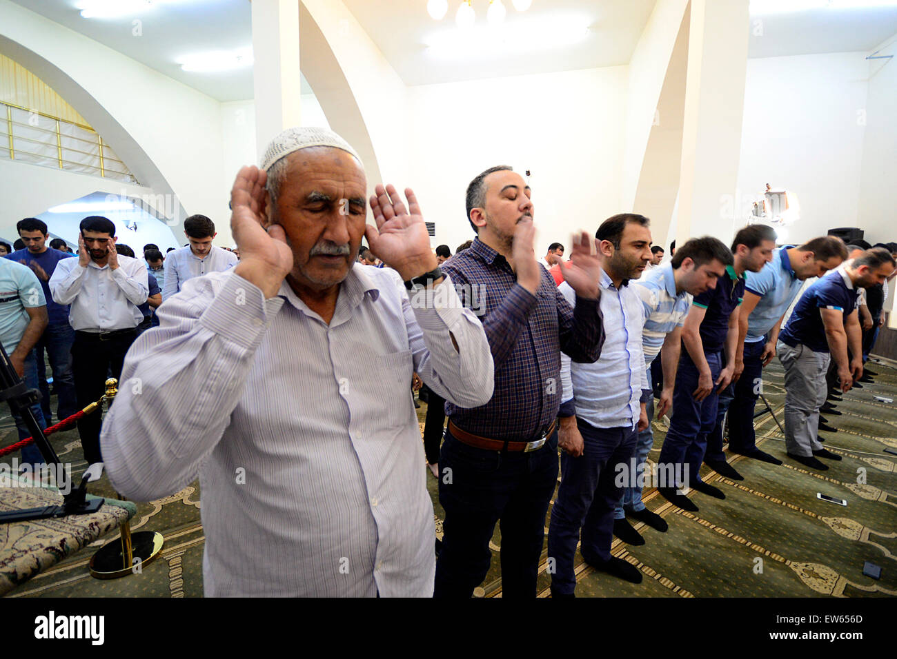 Baku, Azerbaijan. 18th June, 2015. Muslims pray at a Mosque in Baku ...