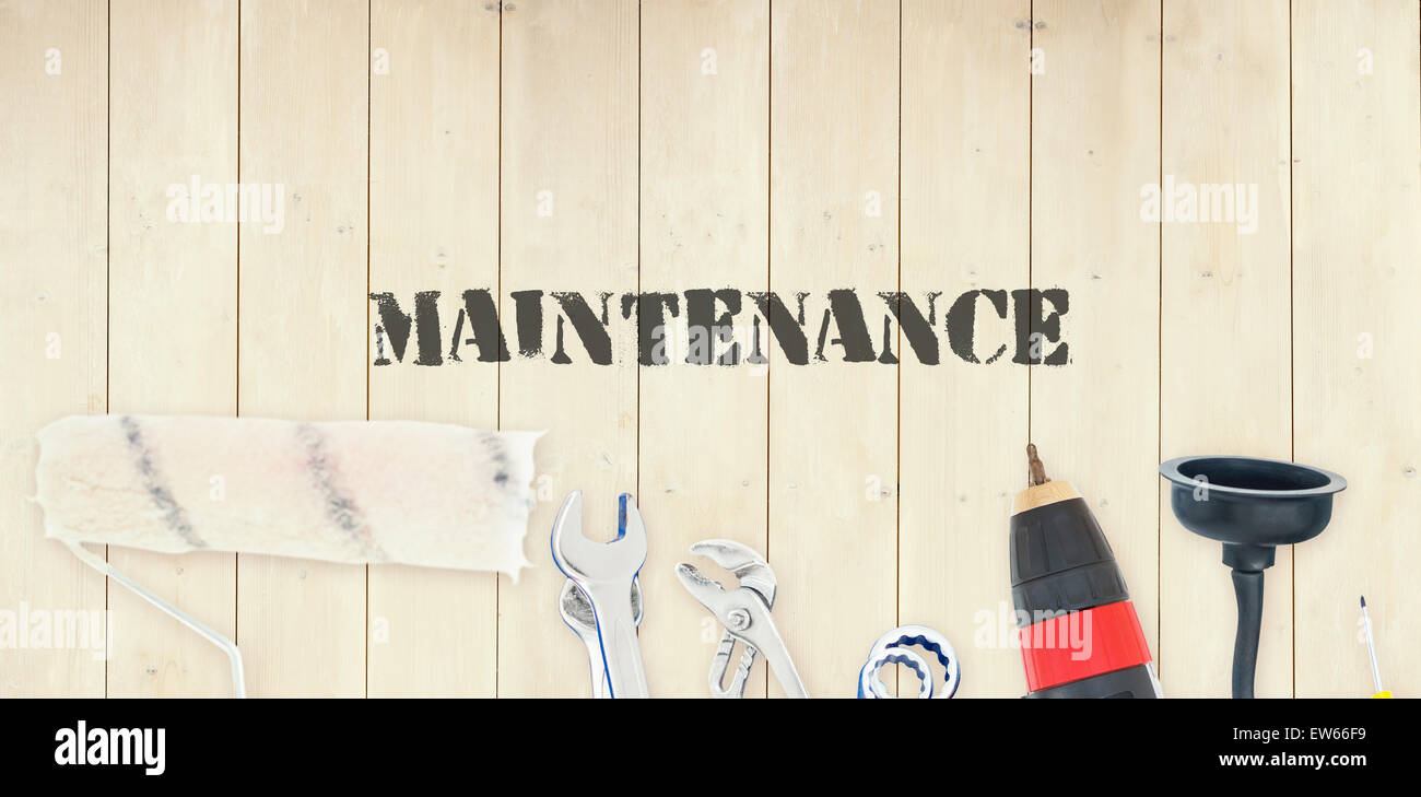 Maintenance against diy tools on wooden background Stock Photo - Alamy