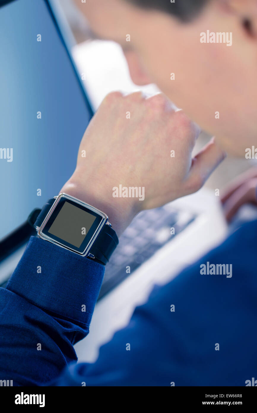 Rear view of businessman watching his smartwatch Stock Photo - Alamy