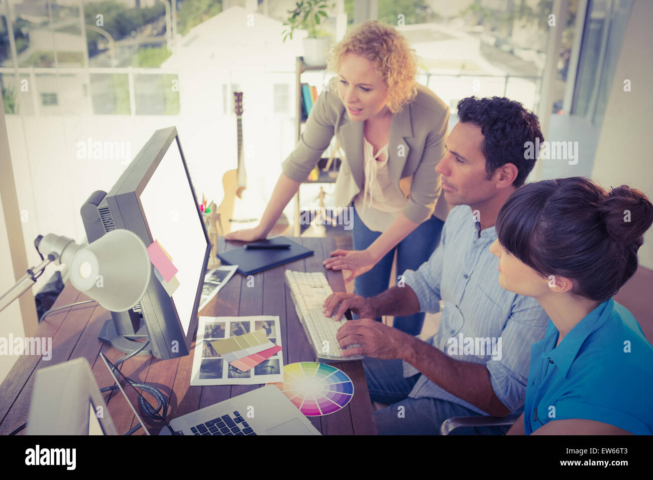 Creative business team working together Stock Photo - Alamy