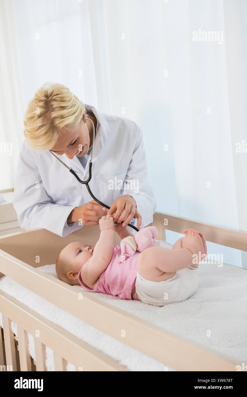 Girl using stethoscope hi-res stock photography and images - Alamy