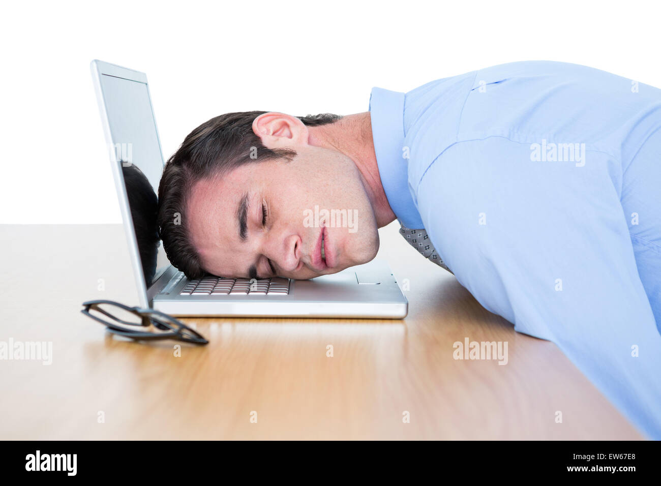 Businessman sleeping head on desk hi-res stock photography and images ...